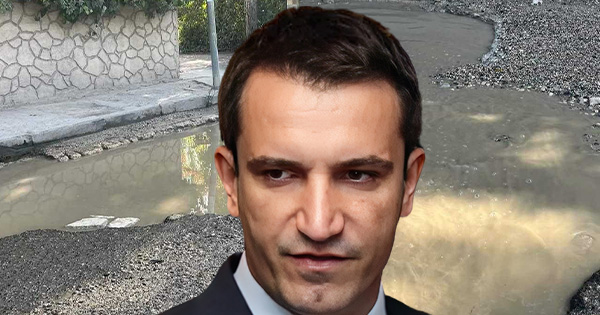 Rruga me gropa që të "bën gropën" në Paskuqan/ "Sikur i mbushin me ...